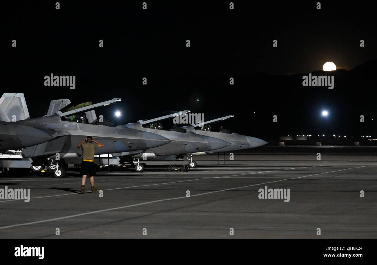 A U.S. Air Force Airman walks on the flightline in preparation of a Red ...