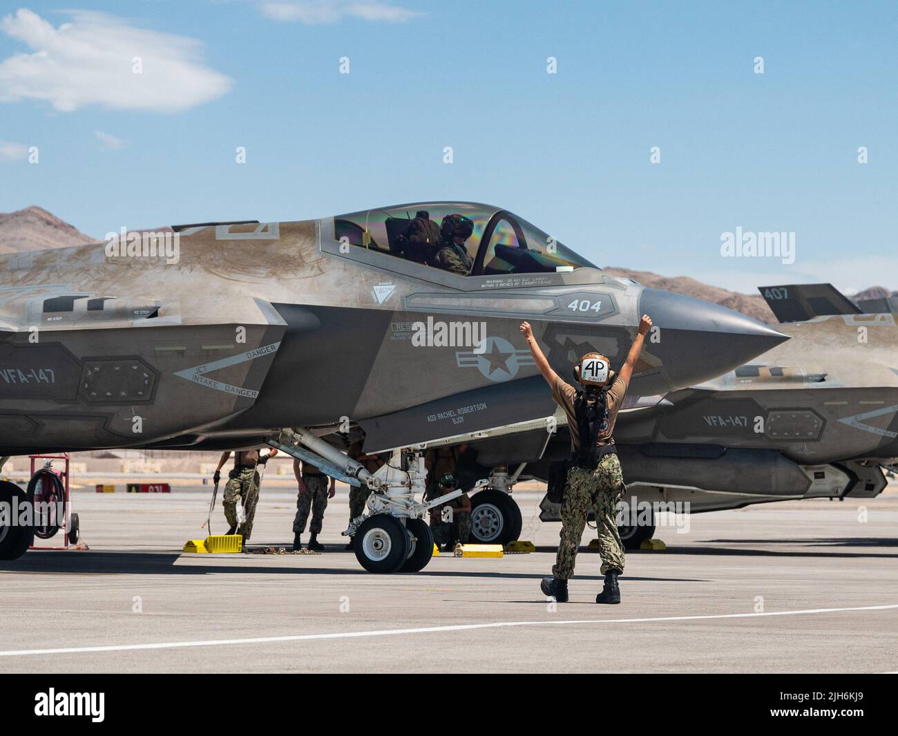 A U.S. Navy Sailor assigned to the Strike Fighter Squadron (VFA) 147, Naval Air Station Lemoore ...