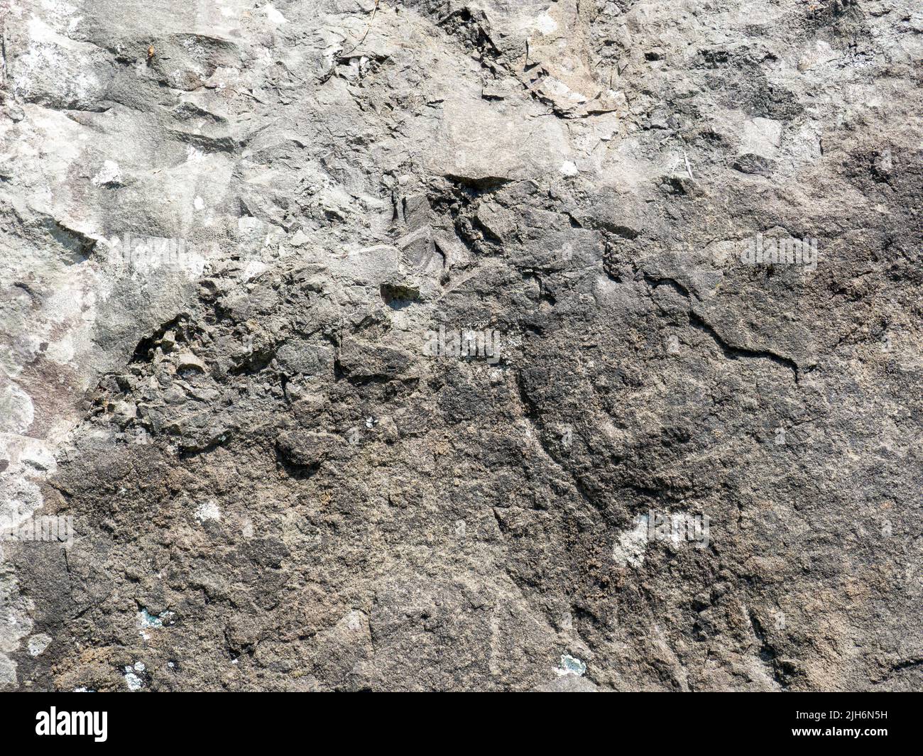Structure of black stone. Background . Solid natural material. Hillside ...