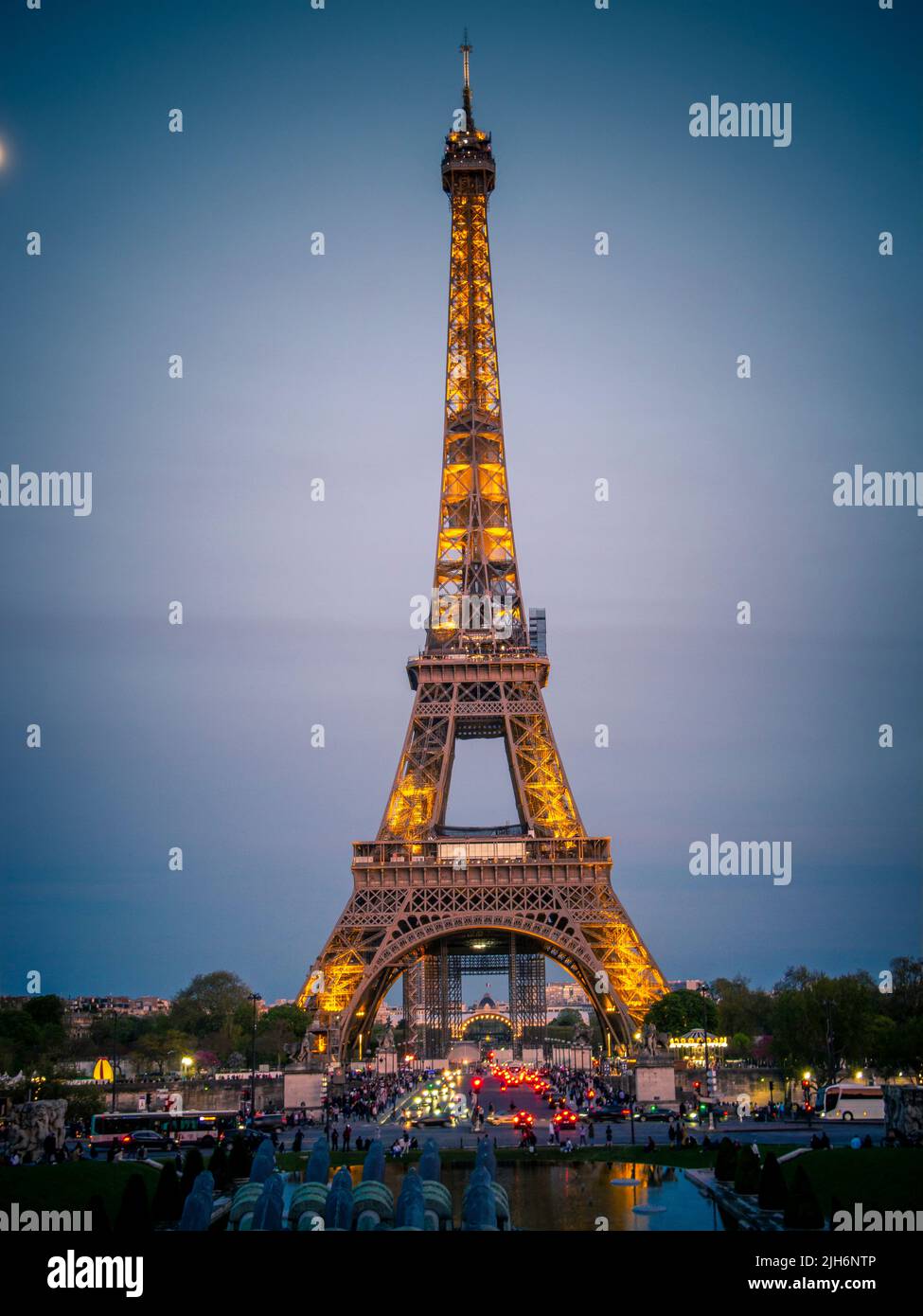 Beautiful view of the Eiffel Tower at night and illuminated Stock Photo ...