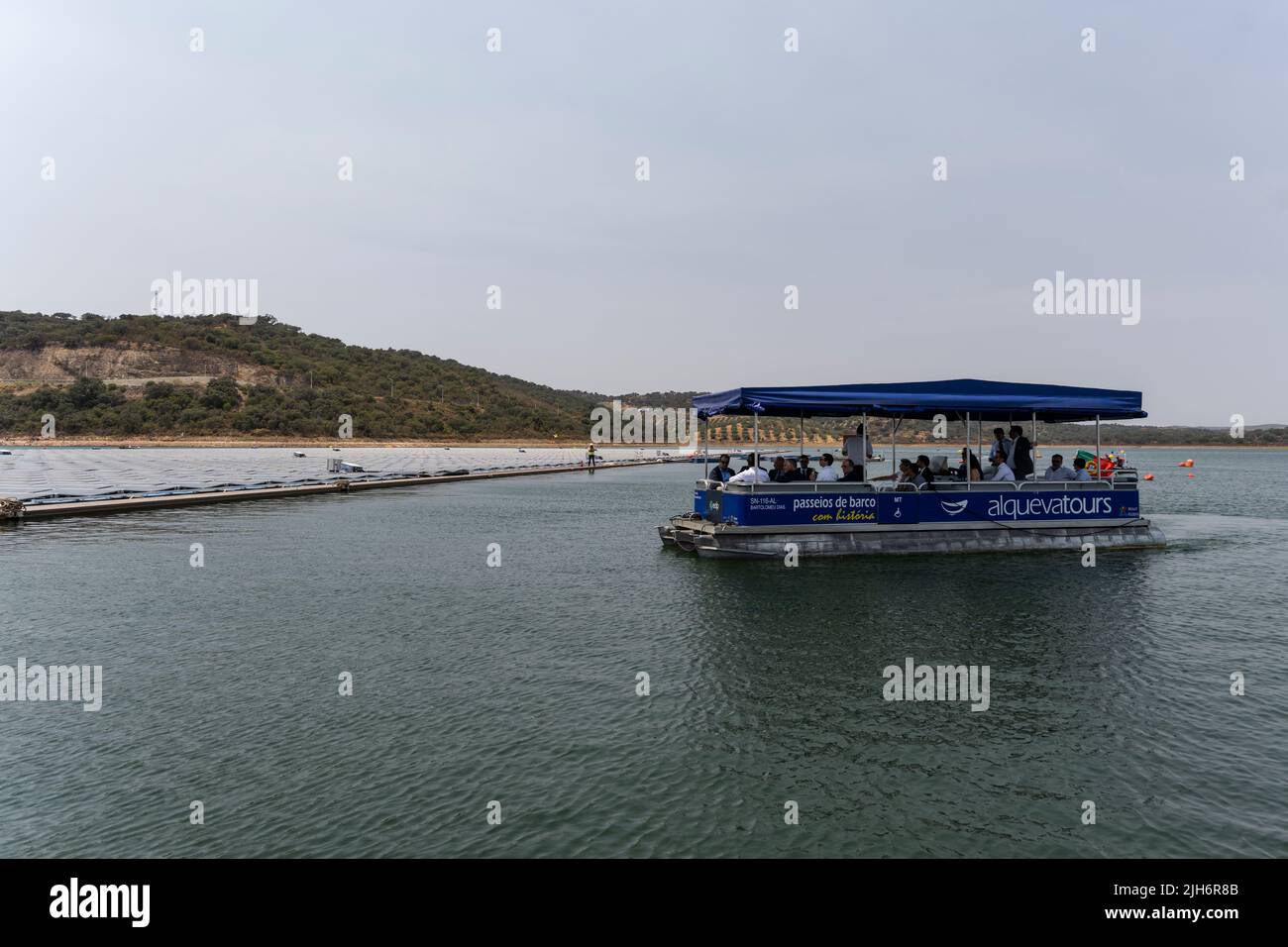 Alqueva, Portugal. 15th July, 2022. A boat with guests is seen close to ...