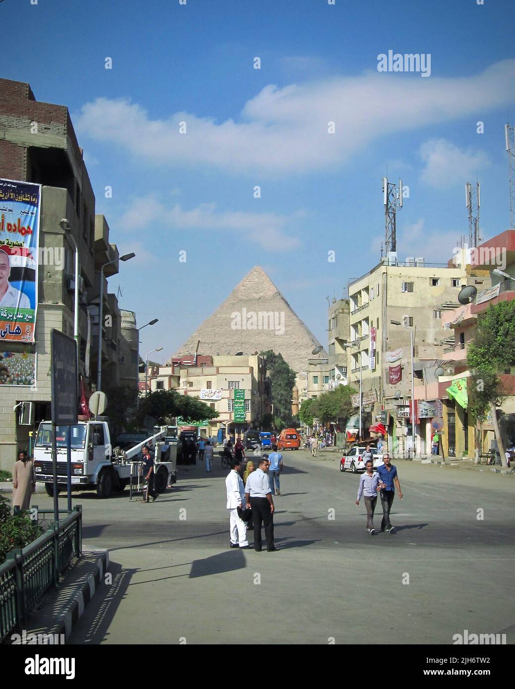 Egyptian Pyramid Visible from an Urban Street in the City of Giza Stock ...