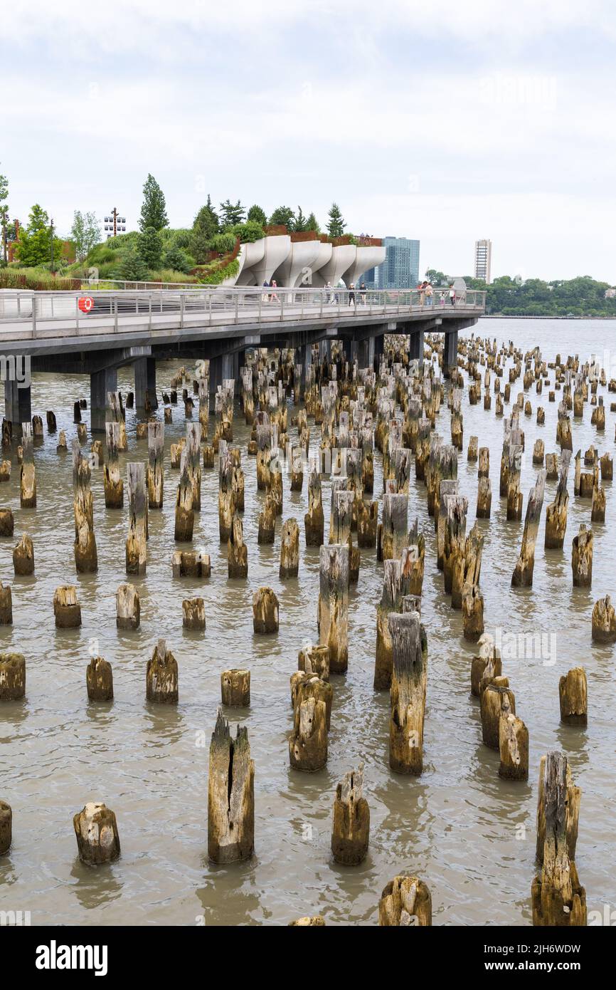 Wooden pier posts leading into Little Island off of Manhattan Stock ...