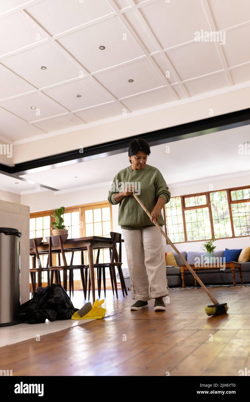 Woman sweeping bathroom hi-res stock photography and images - Alamy