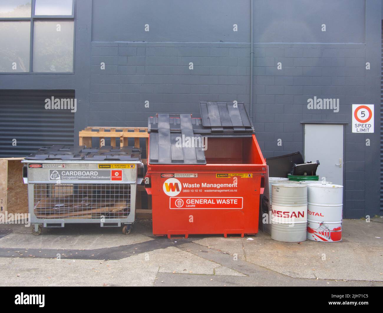 Red rubbish bin outdoors hi-res stock photography and images - Alamy