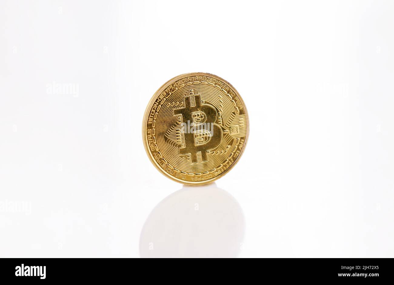 Given a 10 chance of a 100 times payoff. Studio shot of a coin against ...