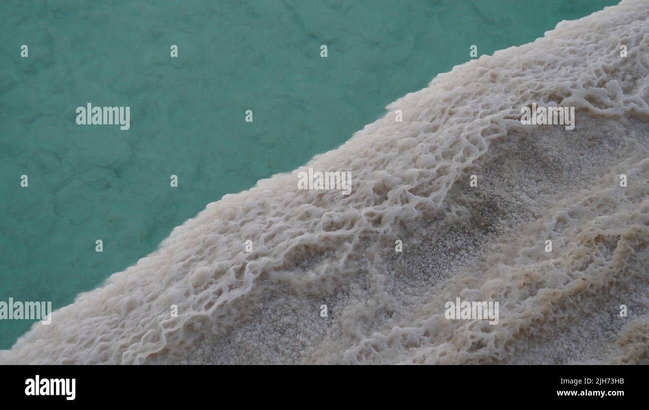 Large Salt accumulated on the shore of the Dead sea. Deposits of ...