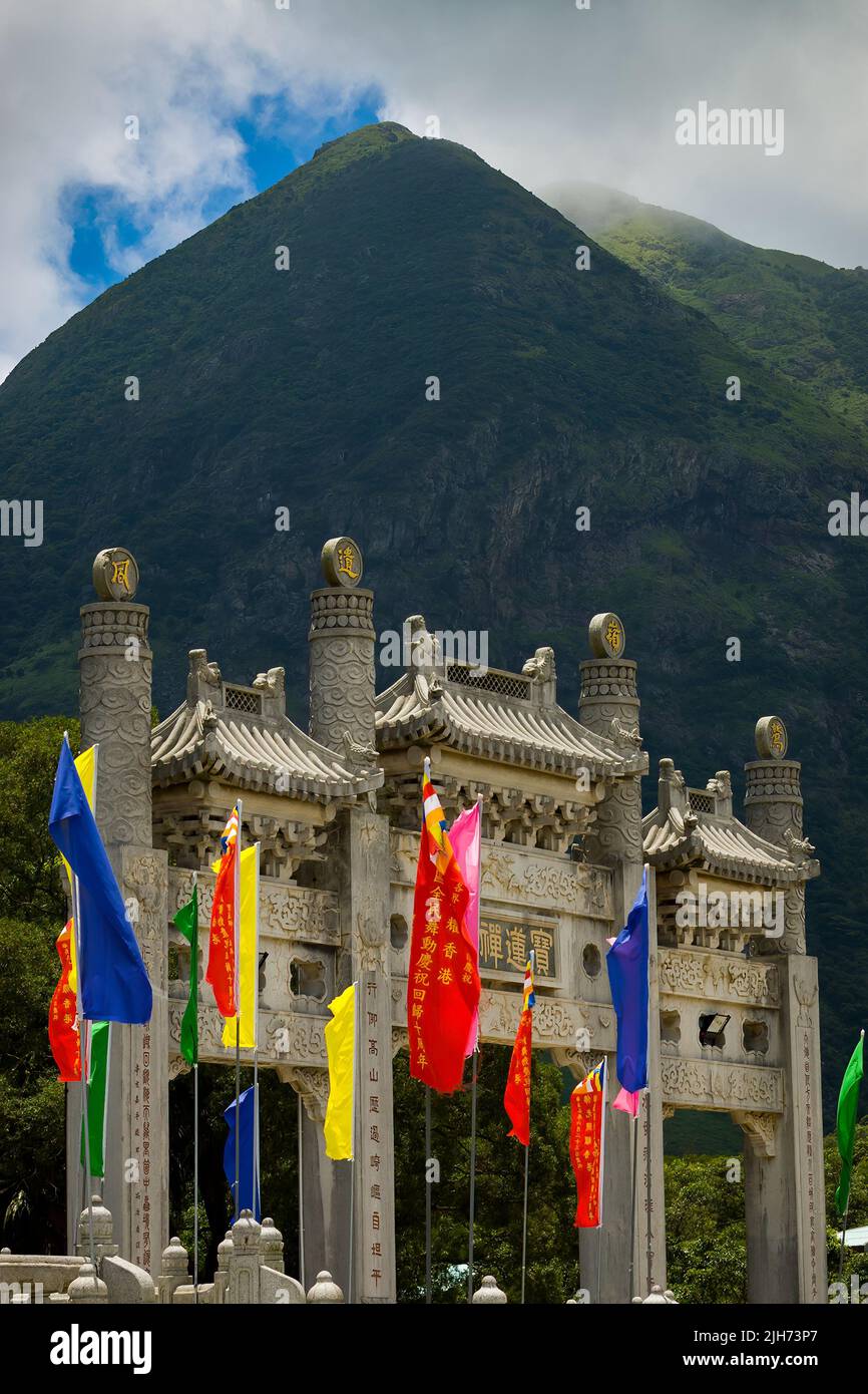 The Mountain Gate (San Men) and Buddhist flags at Po Lin monastery ...