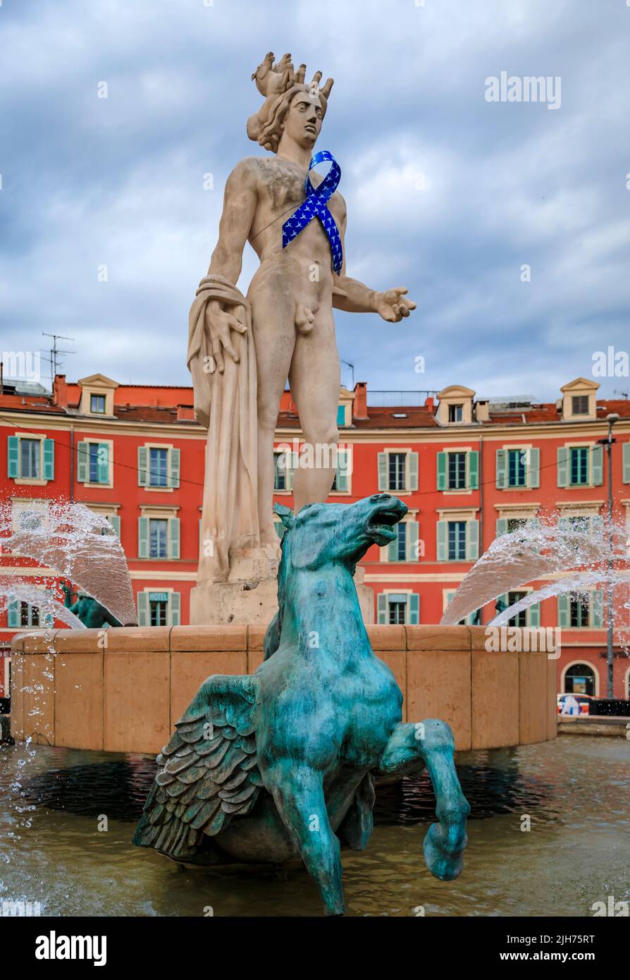 Nice, France - May 25 2022: Statue of Apollo with a blue awareness ...