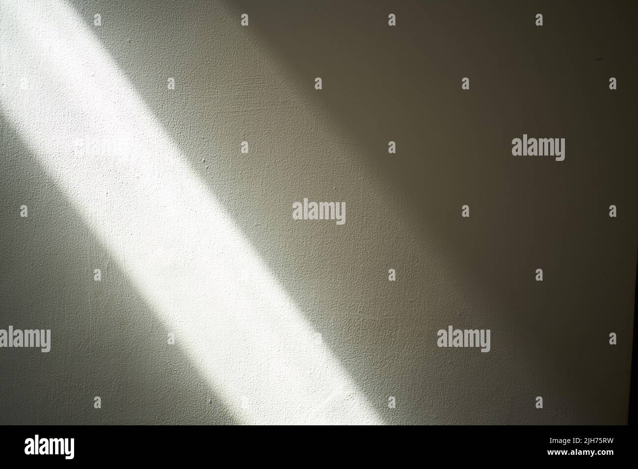 A diagonal stripe of sun light Stock Photo - Alamy