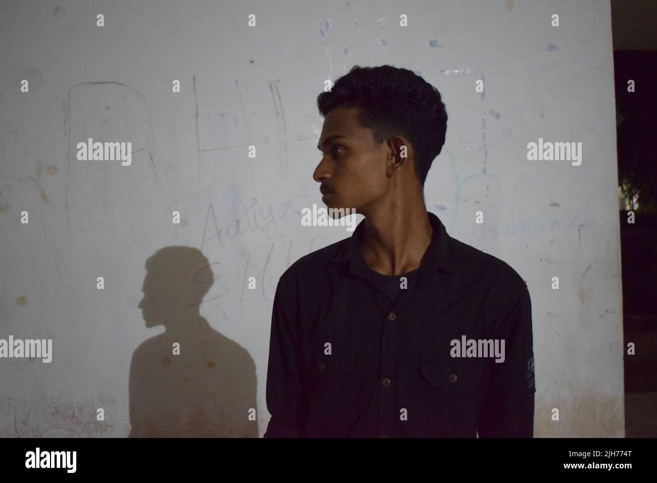 A man and his shadow . Concept -loneliness and depression Stock Photo ...