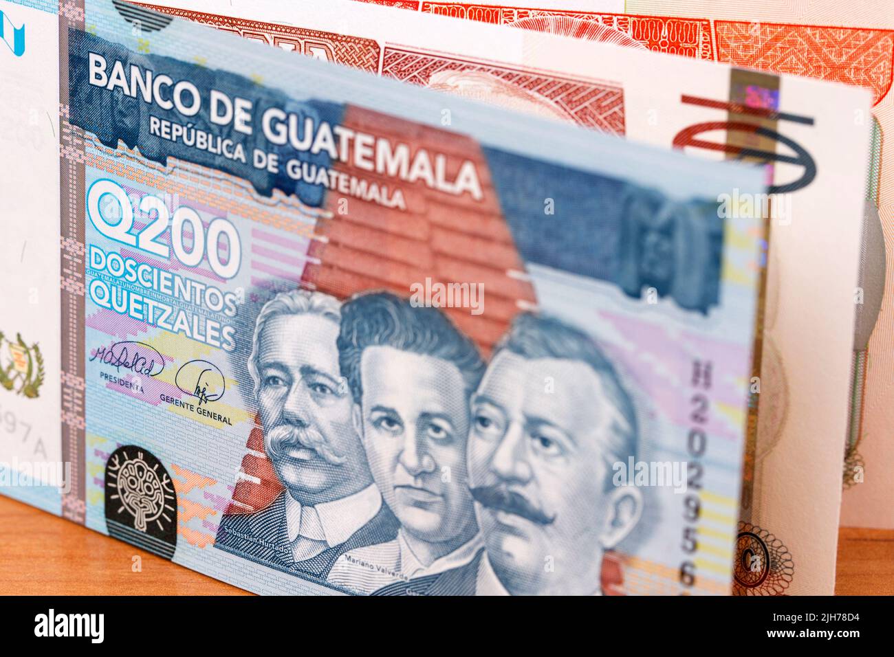 Guatemalan money - Quetzales a business background Stock Photo - Alamy