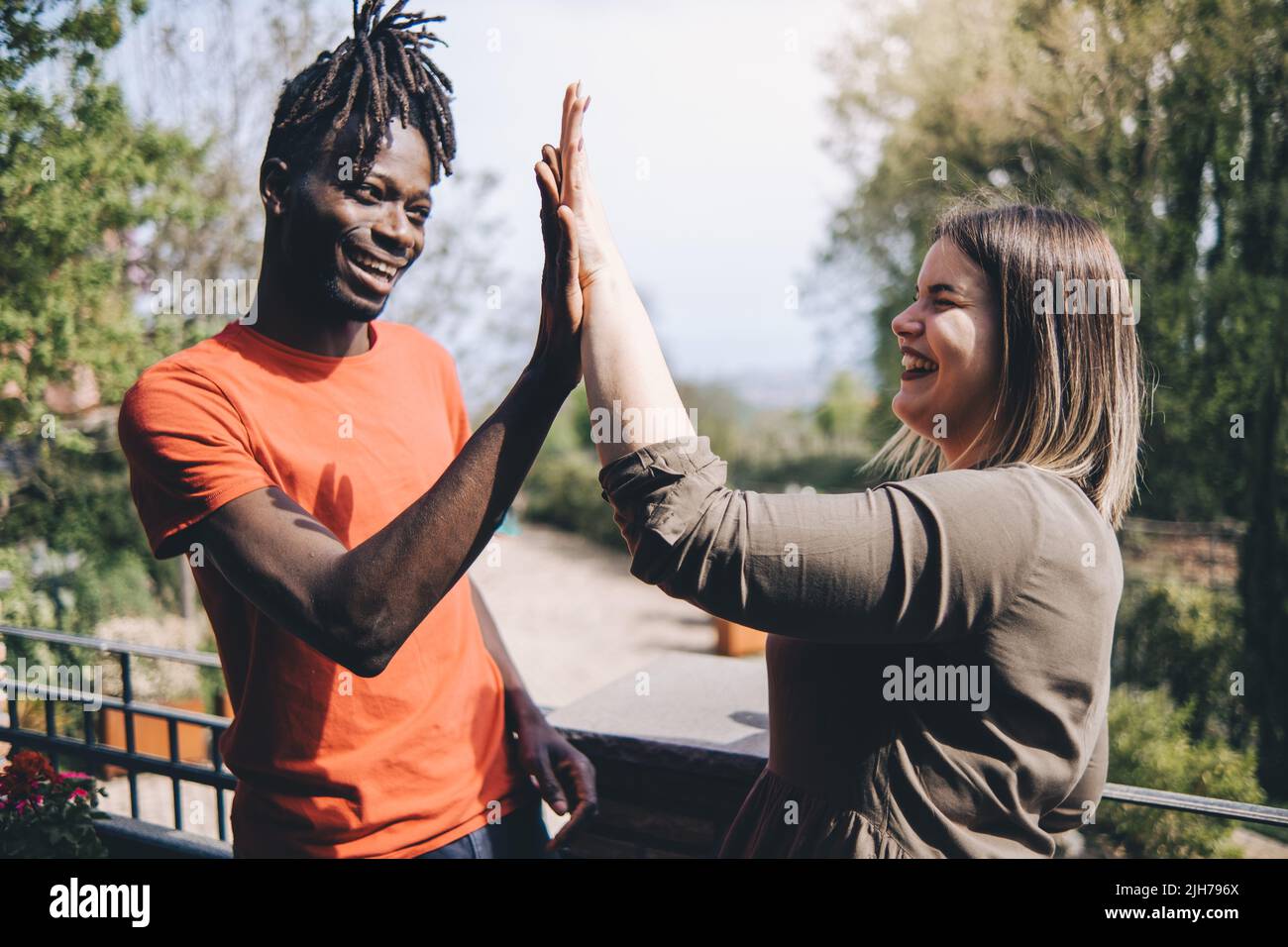 Profile side view of happy african man making greeting gesture give ...