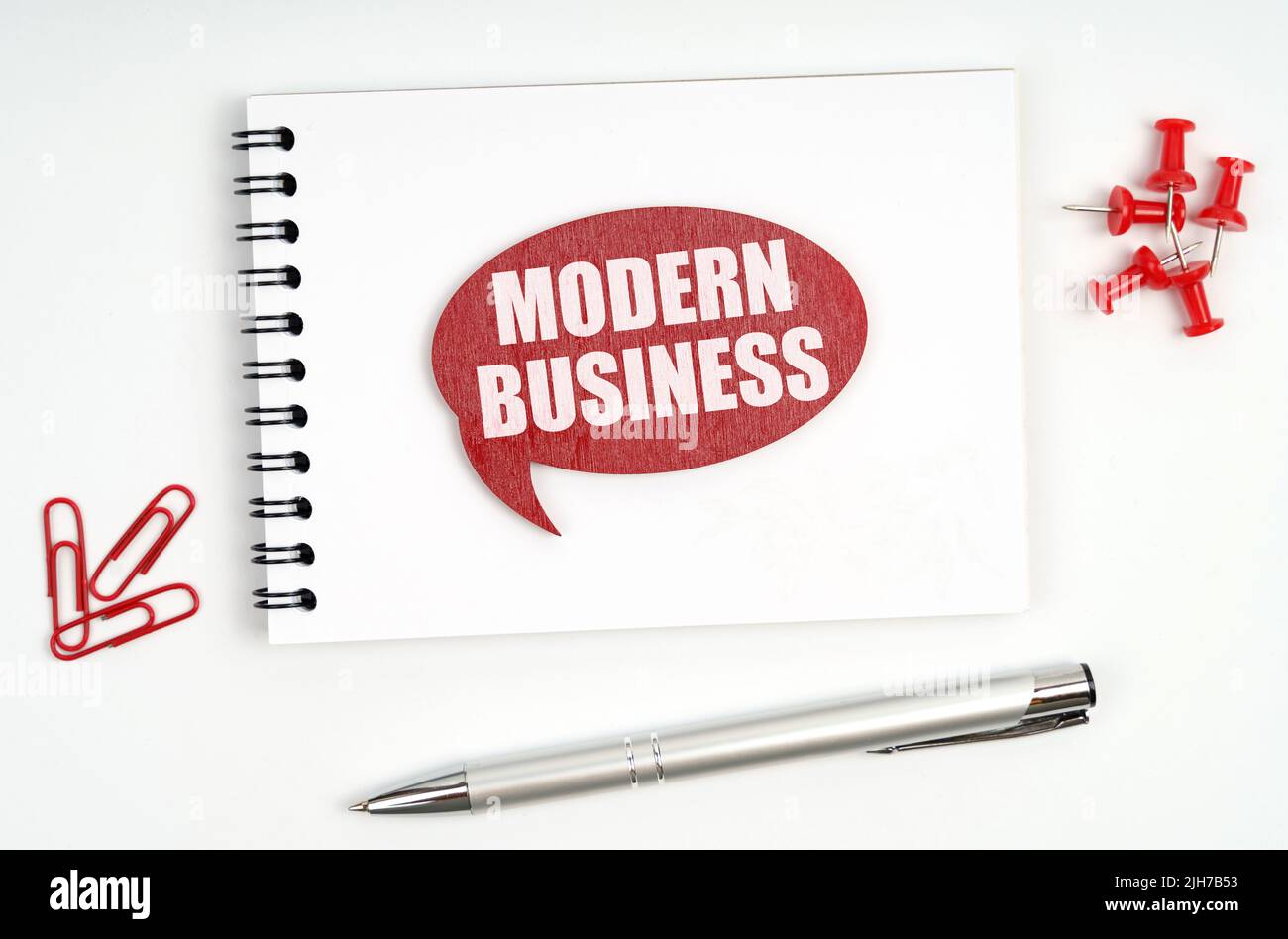 Business concept. On the table there are stationery, a notebook and a ...