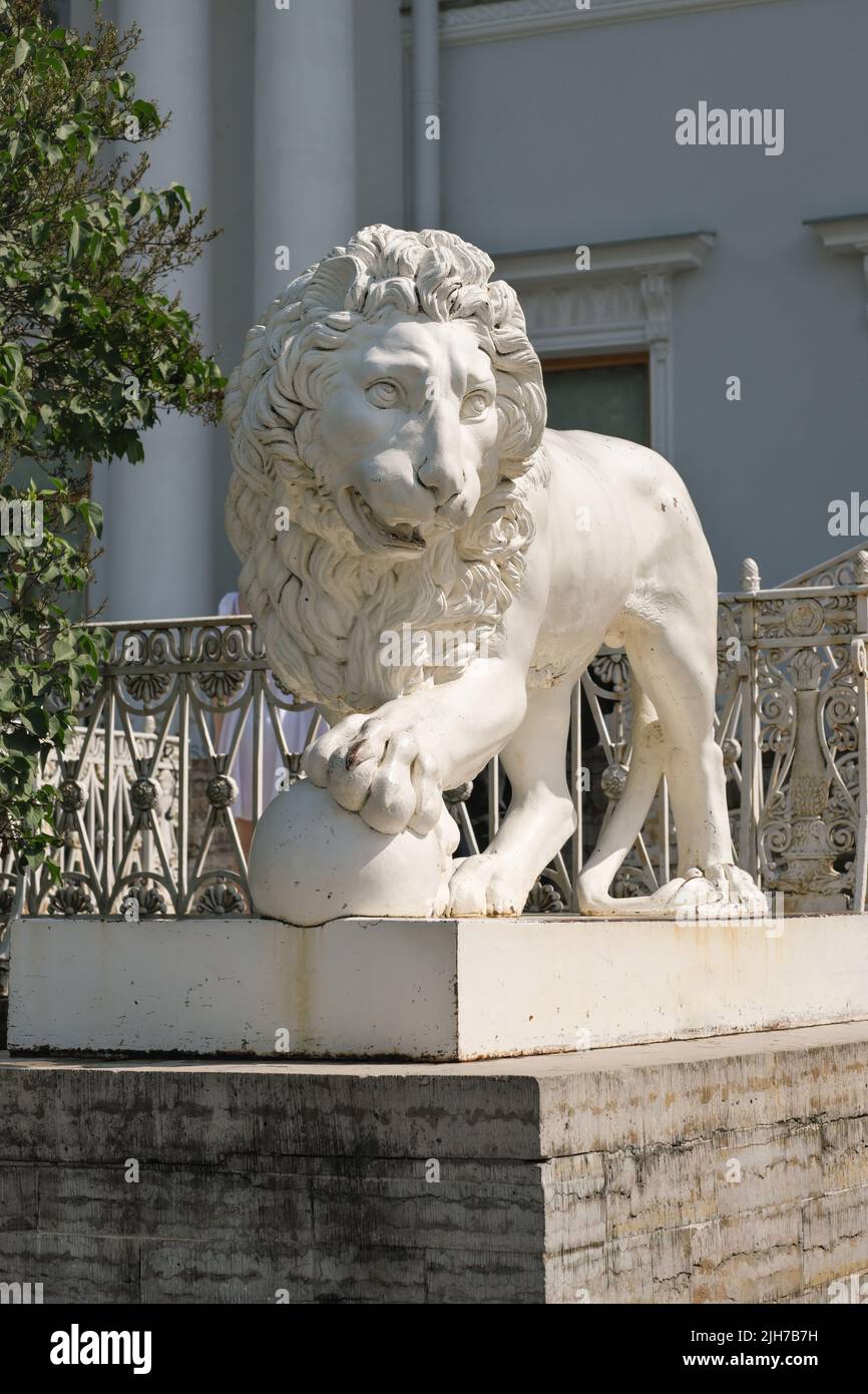 ancient lion sculpture made of stone. vertical shot of lion statue ...