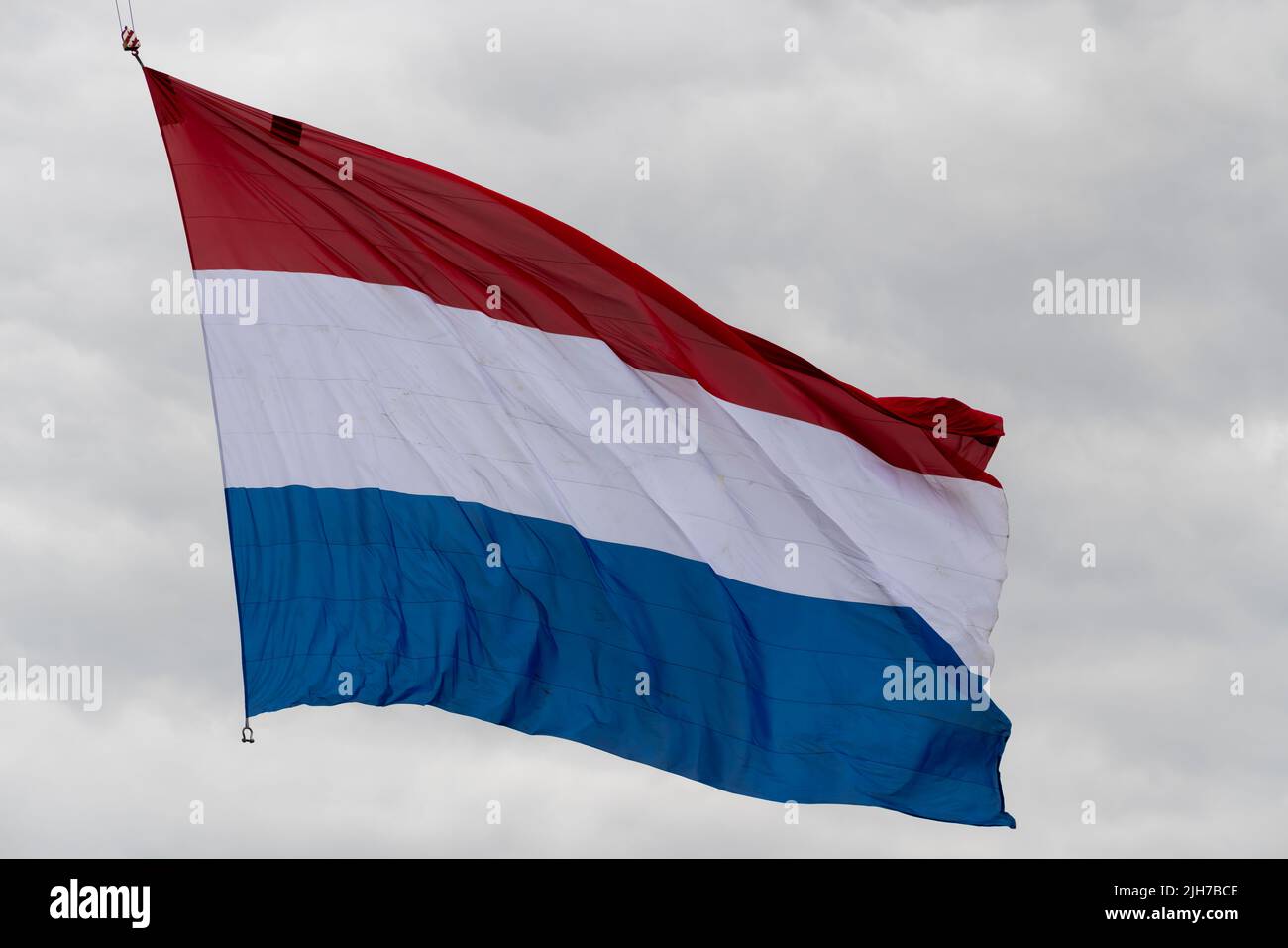 Dutch flag hoisted on a national holiday Stock Photo - Alamy
