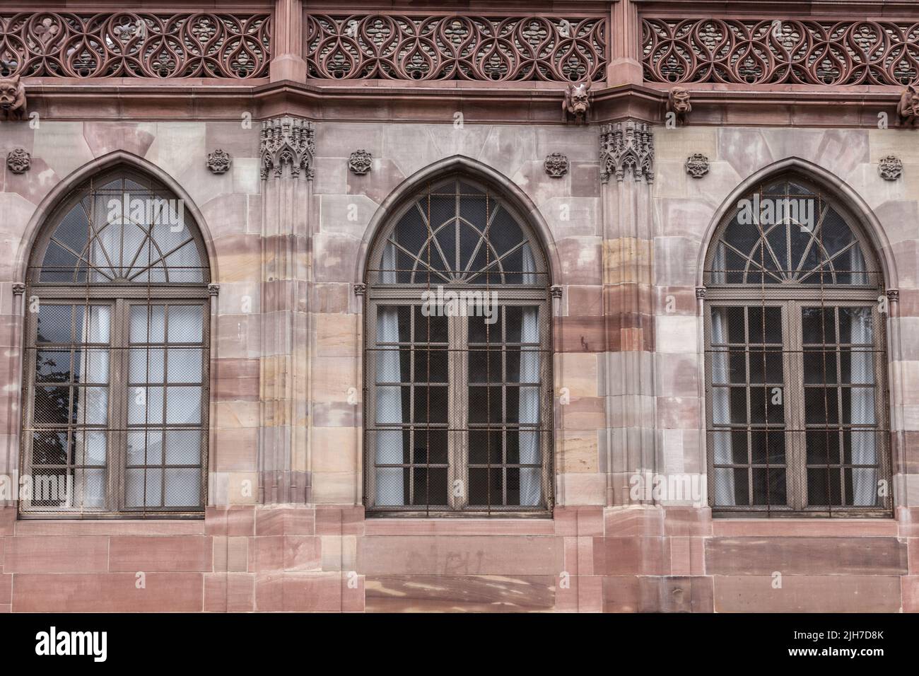 Strasbourg Notre Dame, detail from church's walls, Roman style arch ...