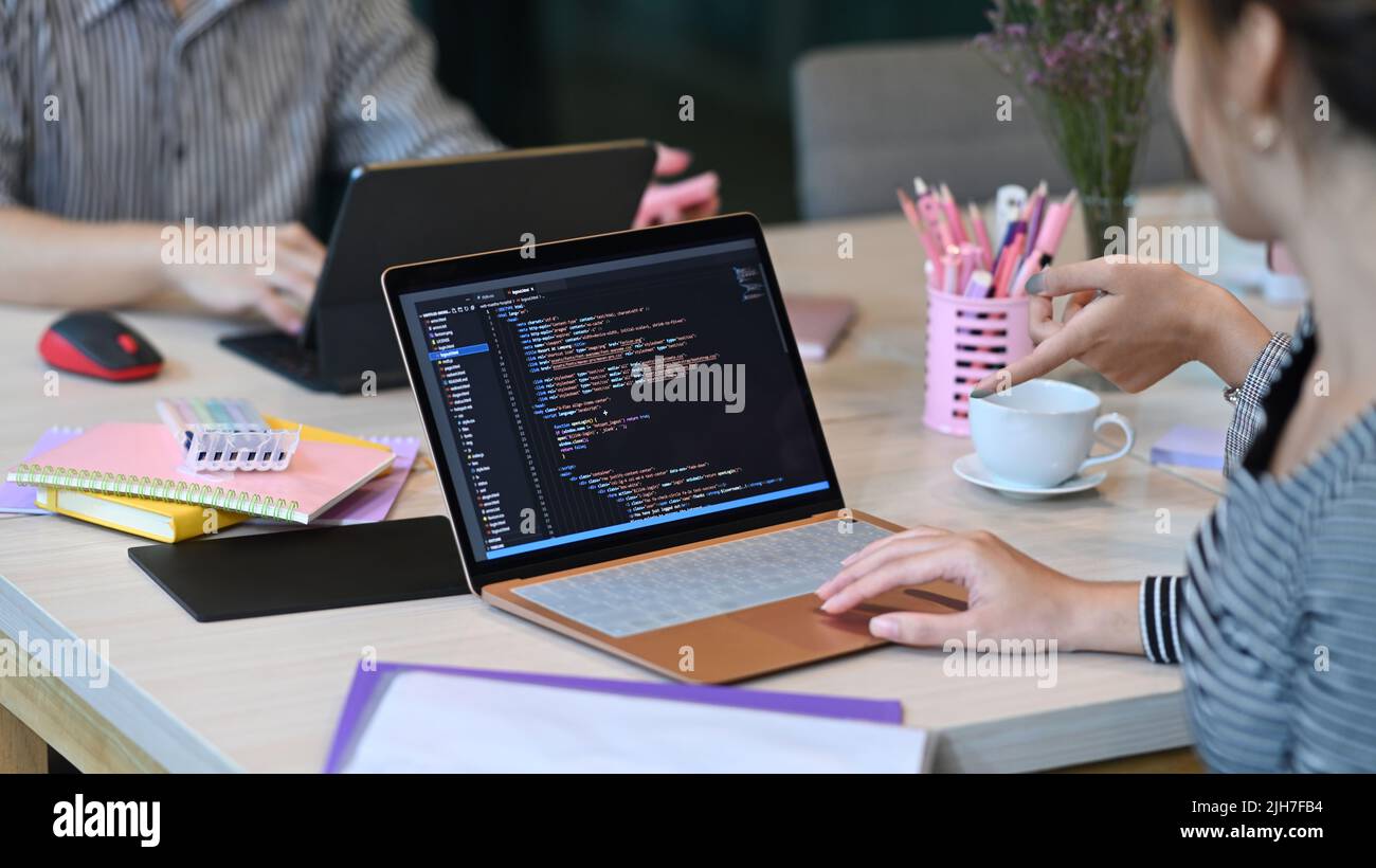 Group of software development are brainstorming ideas for website ...