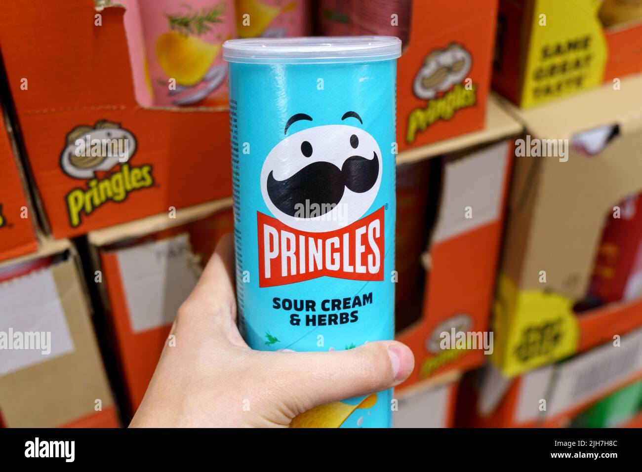 Tyumen, Russia-May 08, 2022: Pringles sour cream products with a new ...