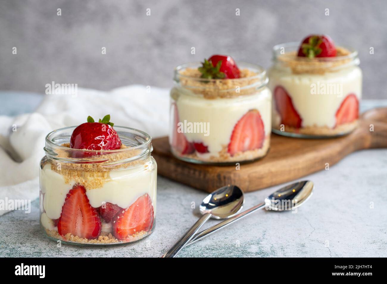 Strawberry magnolia. Dessert with cream and strawberry filling on a ...