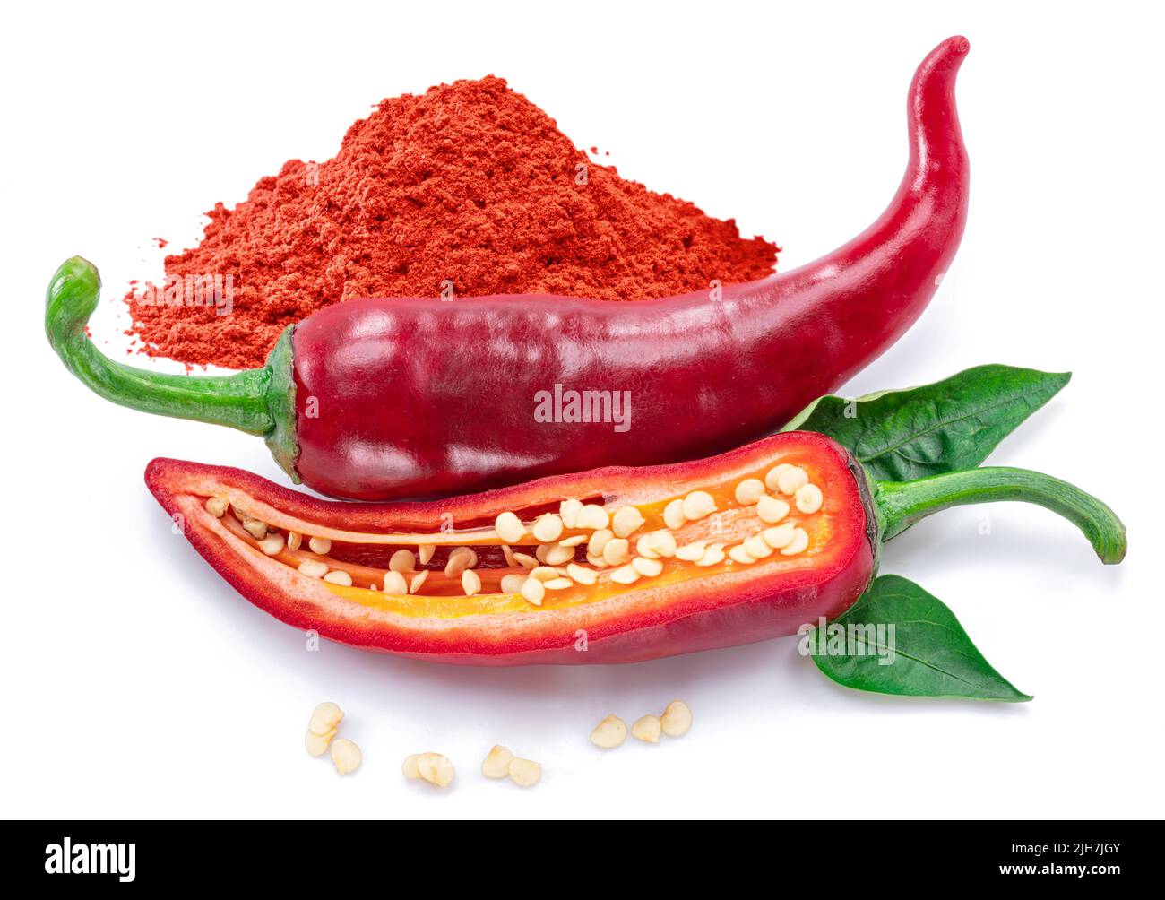 Fresh red chilli peppers, cross section of chilli pepper and ground ...