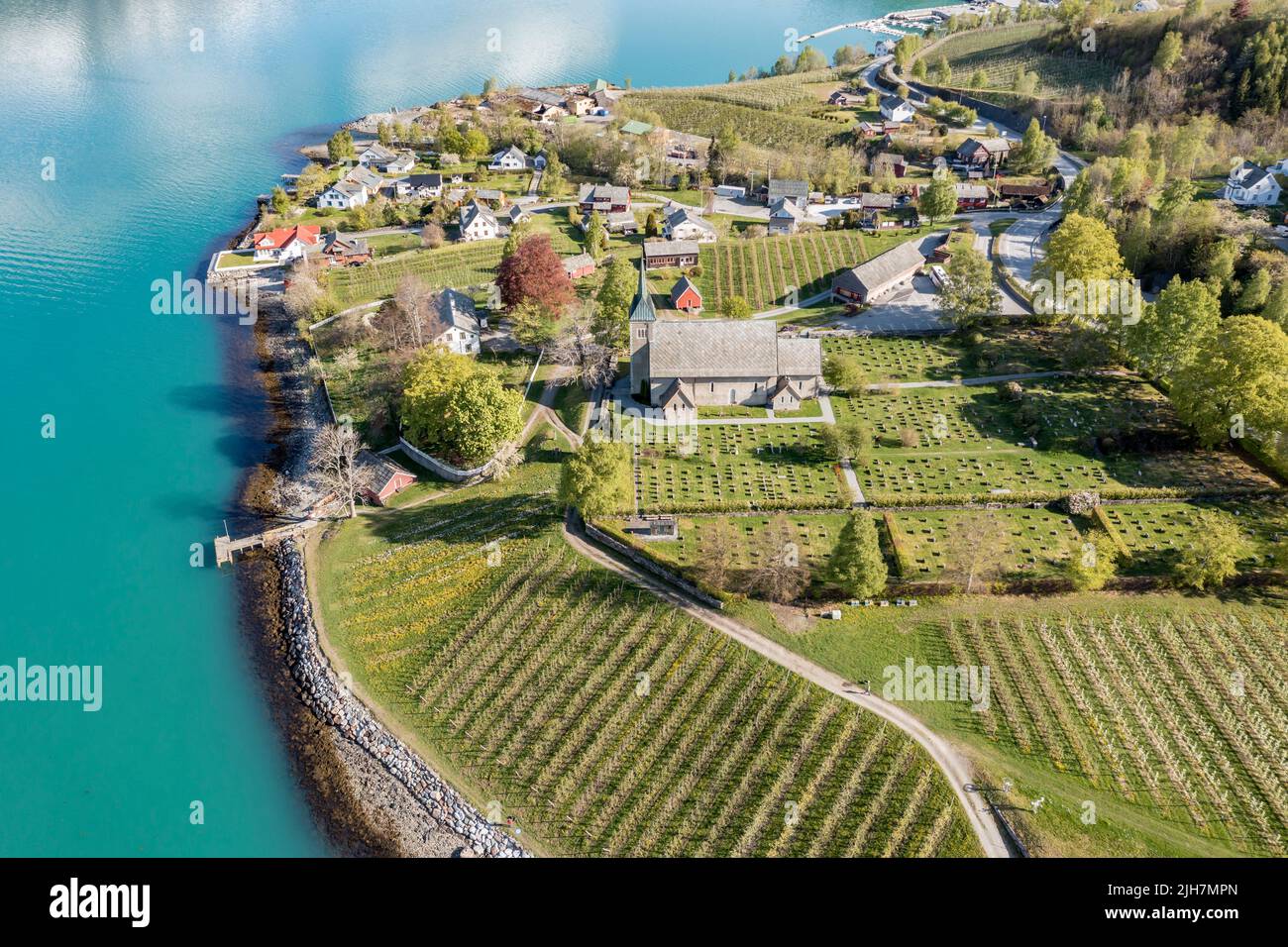 Aerial view of church and apple orchards, Ullensvang near Lofthus ...