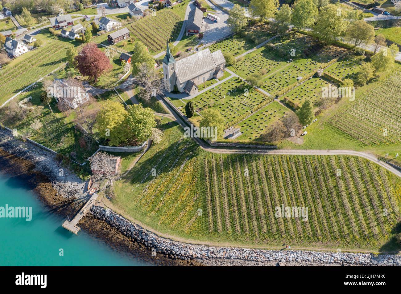 Aerial view of church and apple orchards, Ullensvang near Lofthus ...