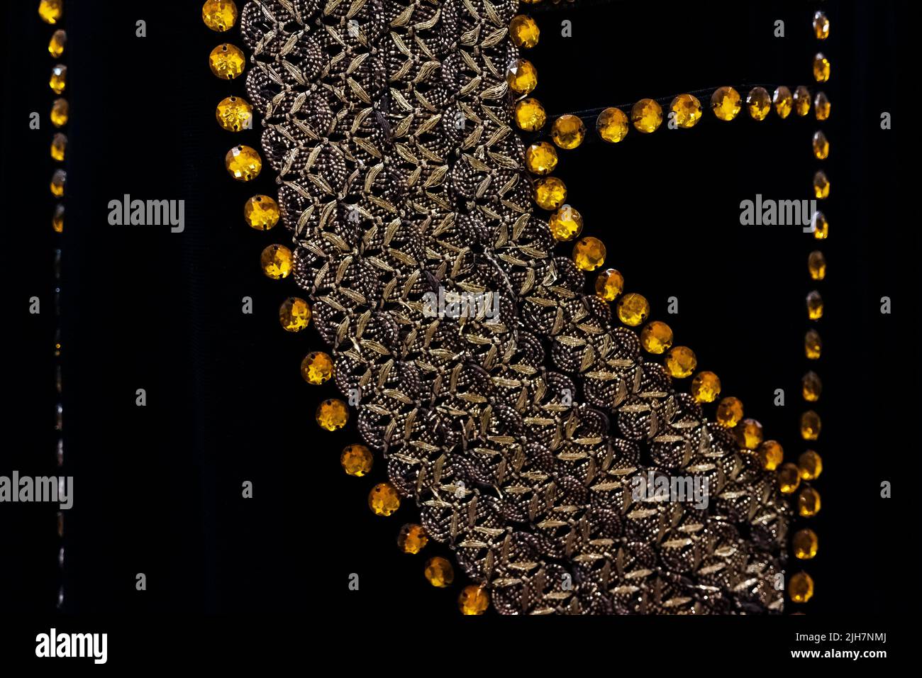 Details and textures of the fabric of a traditional Greek dress with ...