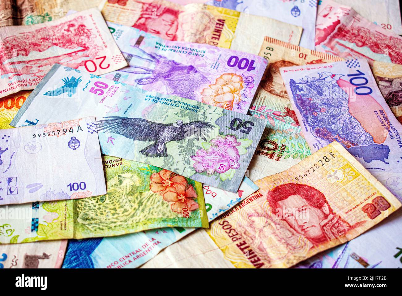 Argentine pesos of different values. Money from Argentina in cash Stock ...