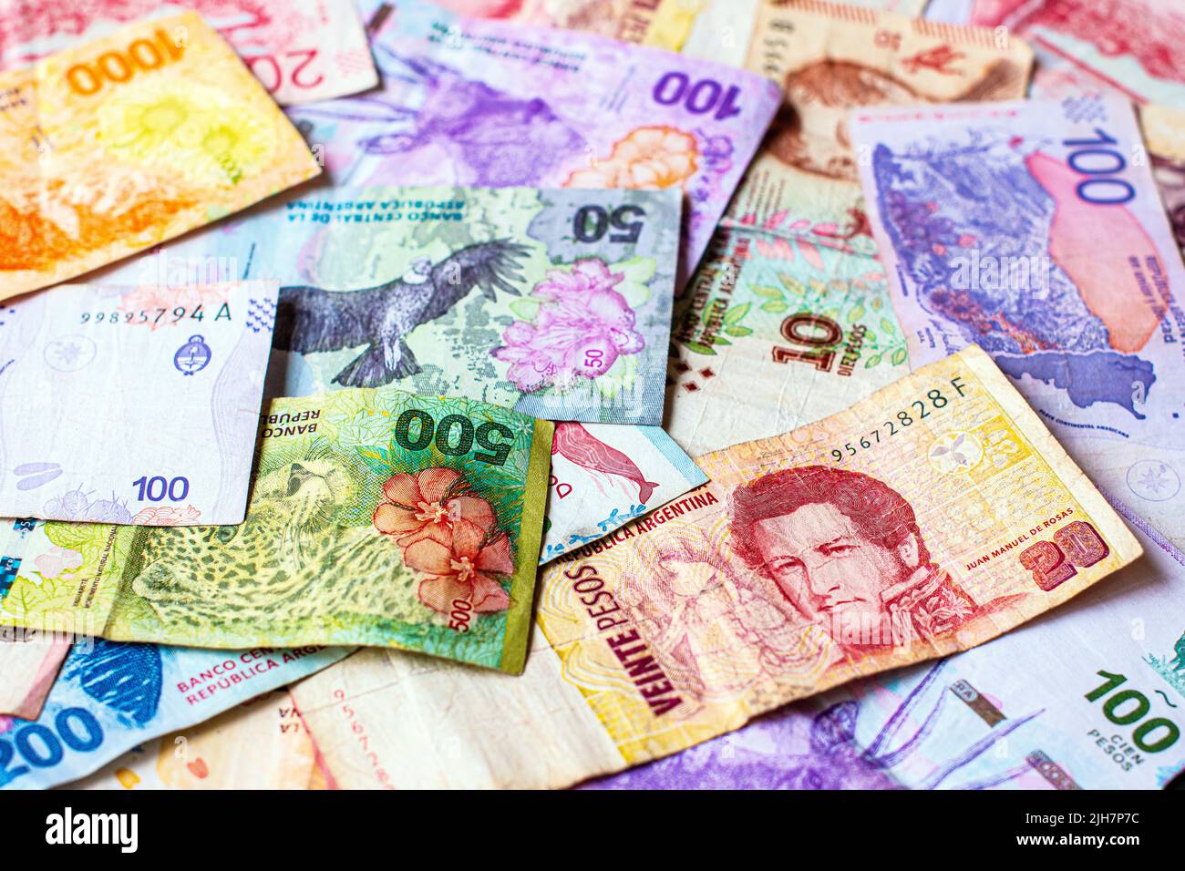 Argentine pesos of different values. Money from Argentina in cash Stock ...