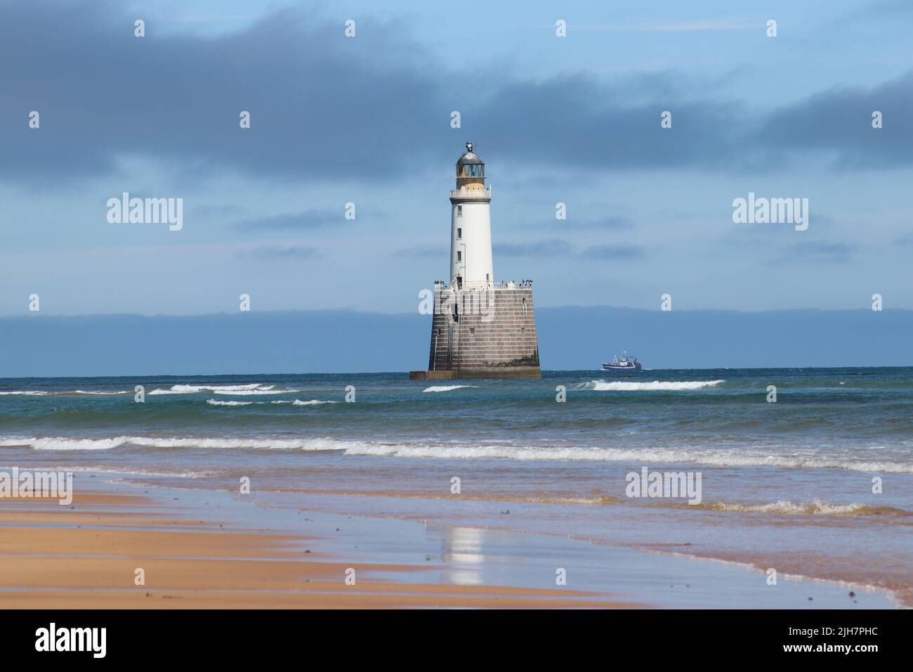 White lighthouse on platform in sea Stock Photo - Alamy