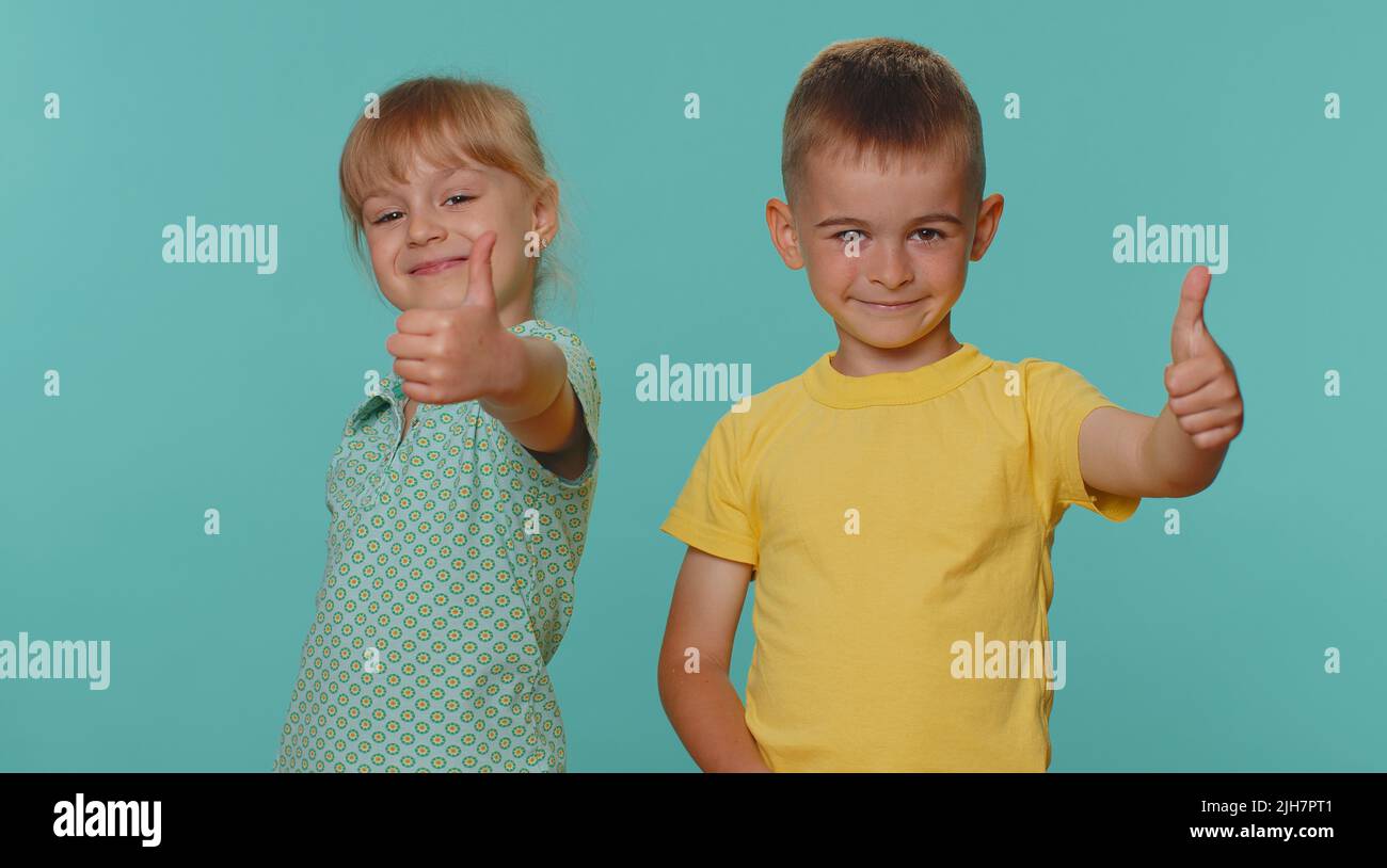 Like. Little toddler children boy and girl siblings or friends raises ...