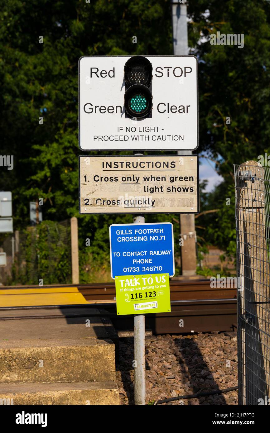 Pedestrian crossing lights over the east coast main line at Offord ...
