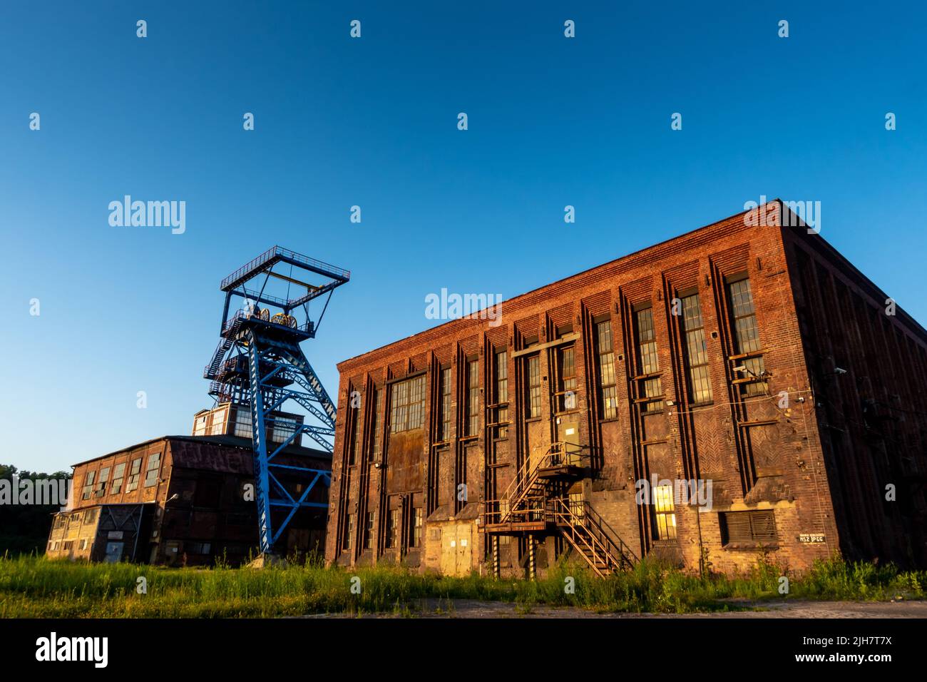 Distant view for the shaft tower of a closed black coal mine ...