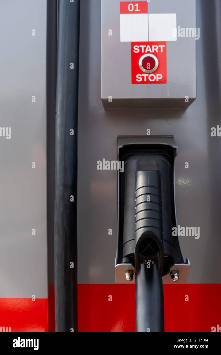 Fast charging plugs at public electric car charging stations ...