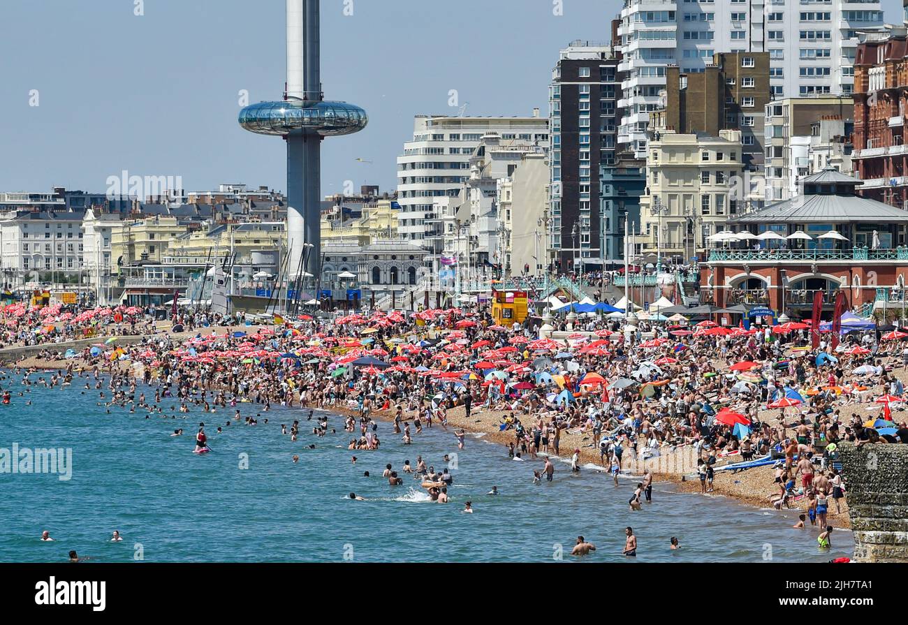 Brighton UK 16th July 2022 - Brighton beach is packed as crowds enjoy ...
