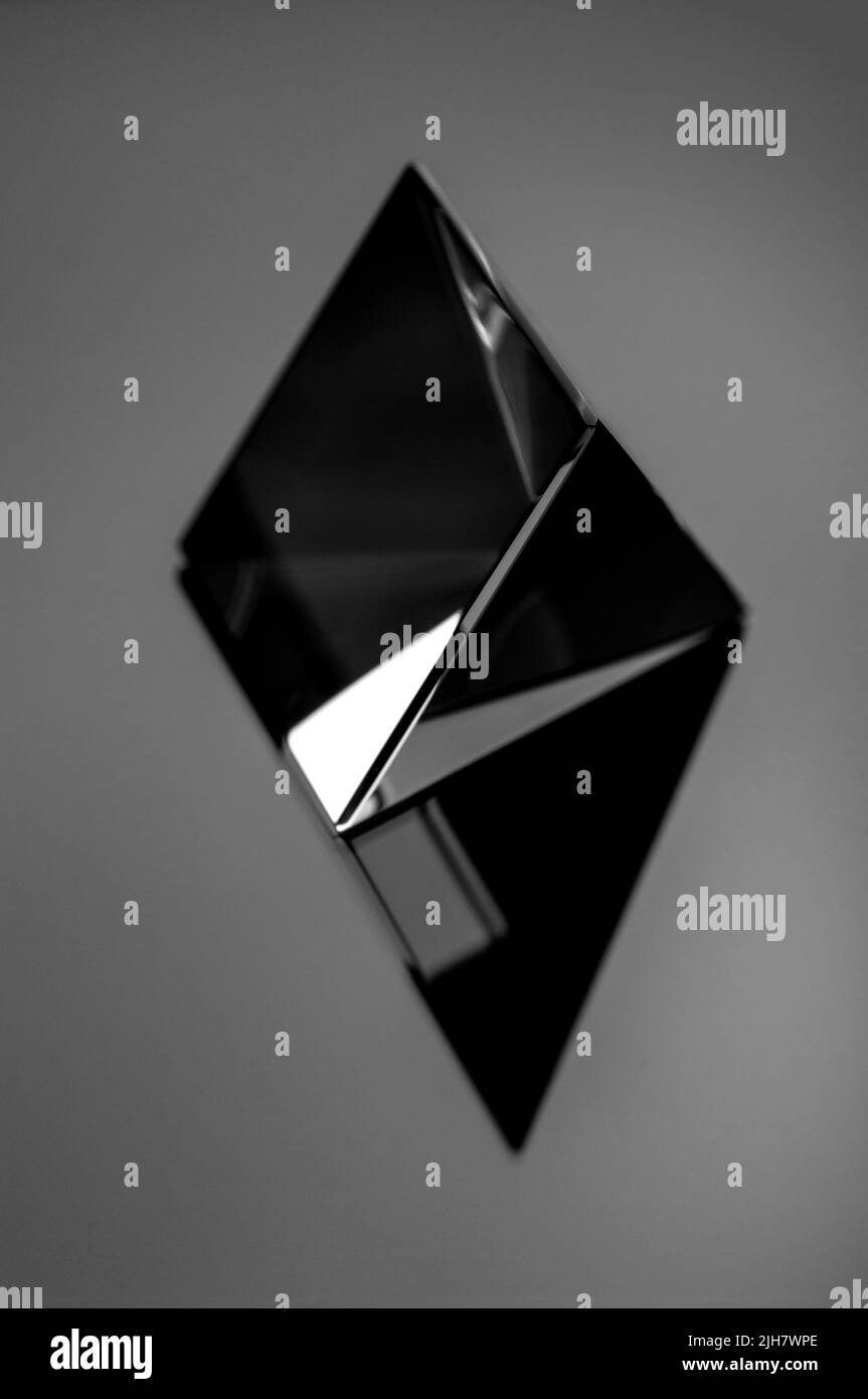 Shiny glass geometric figure in black and white. Black minimal still ...