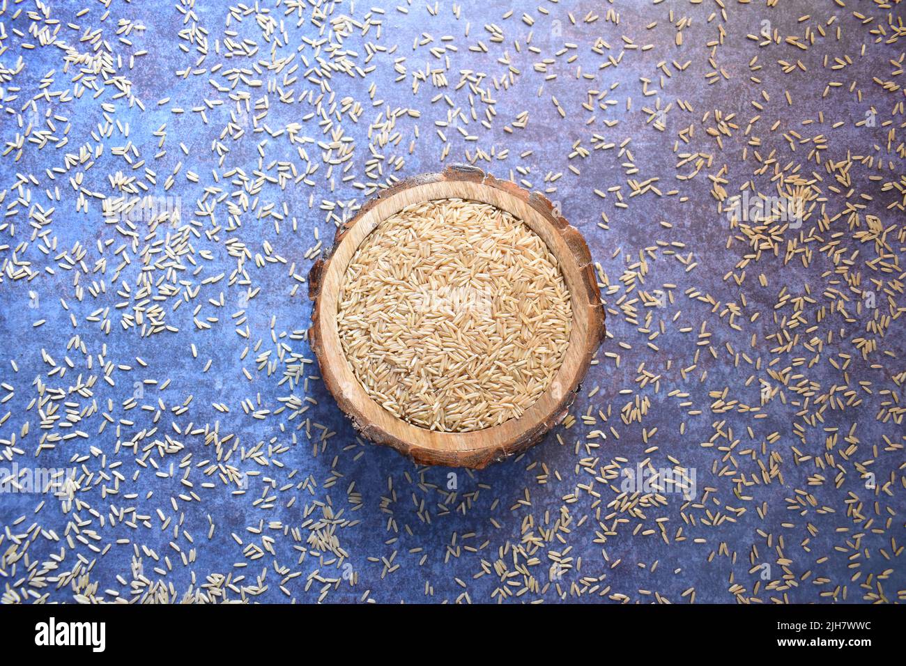 Raw whole dried brown Basmati rice Stock Photo - Alamy