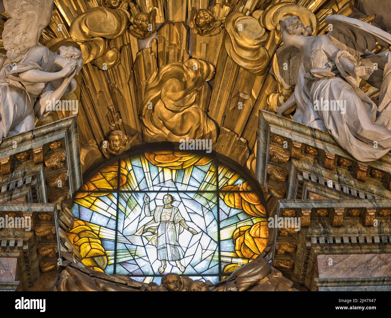 Stained glass window and ornate sculptures in 18th century Baroque ...