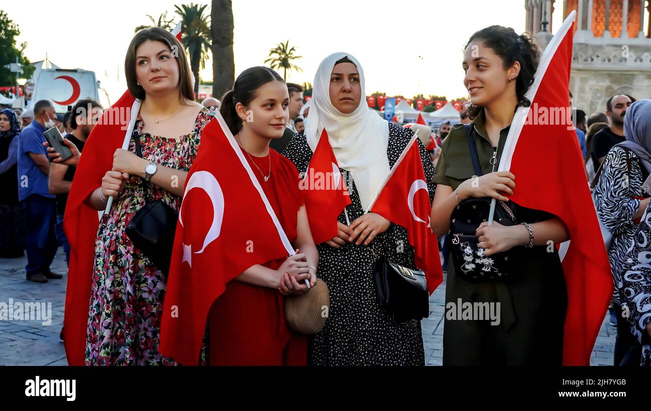 Izmir, Turkey. 15th July, 2022. People with Turkish flags, some of them ...