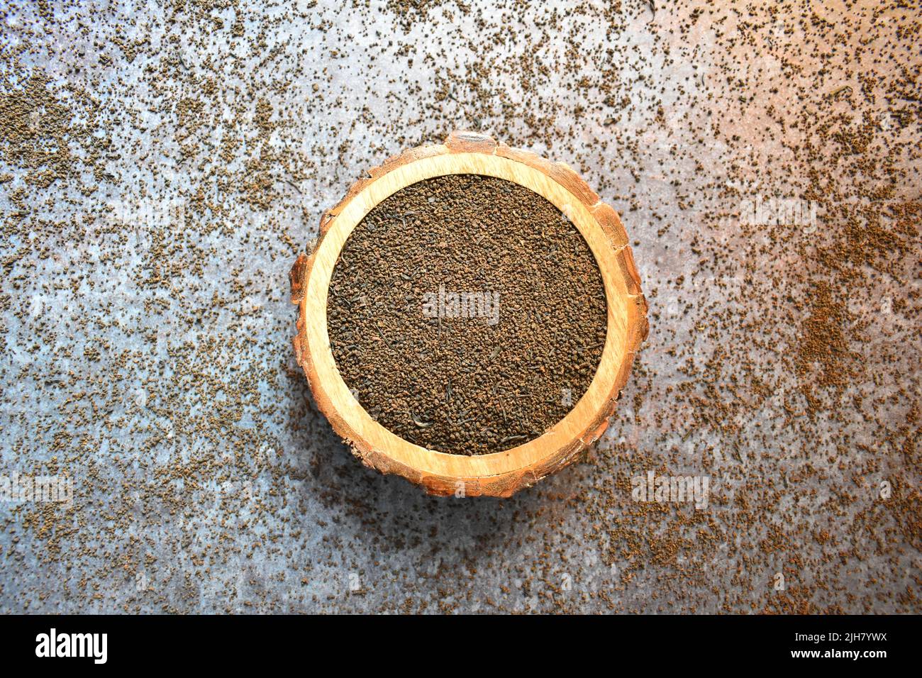 Raw coarse dried tea leaves powder Stock Photo - Alamy