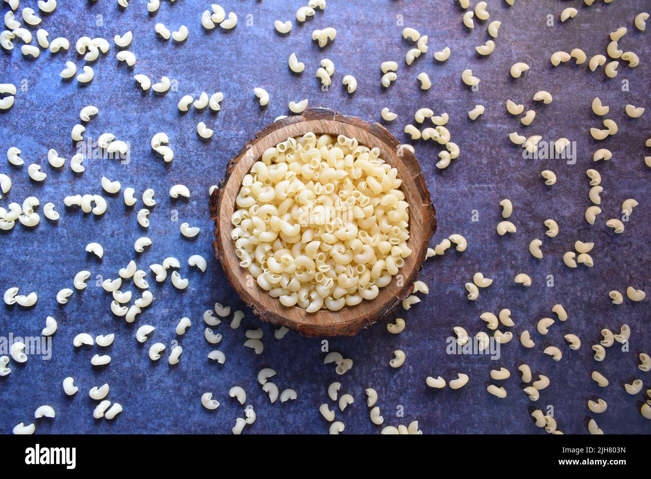 Raw whole dried Macaroni pasta Stock Photo - Alamy