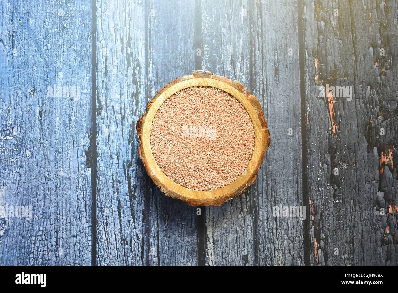 Raw broken dried Matta red parboiled rice Stock Photo - Alamy