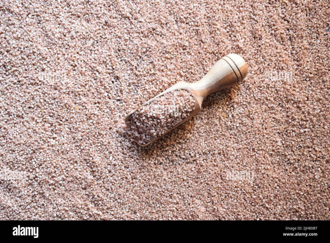 Raw broken dried Matta red parboiled rice Stock Photo - Alamy