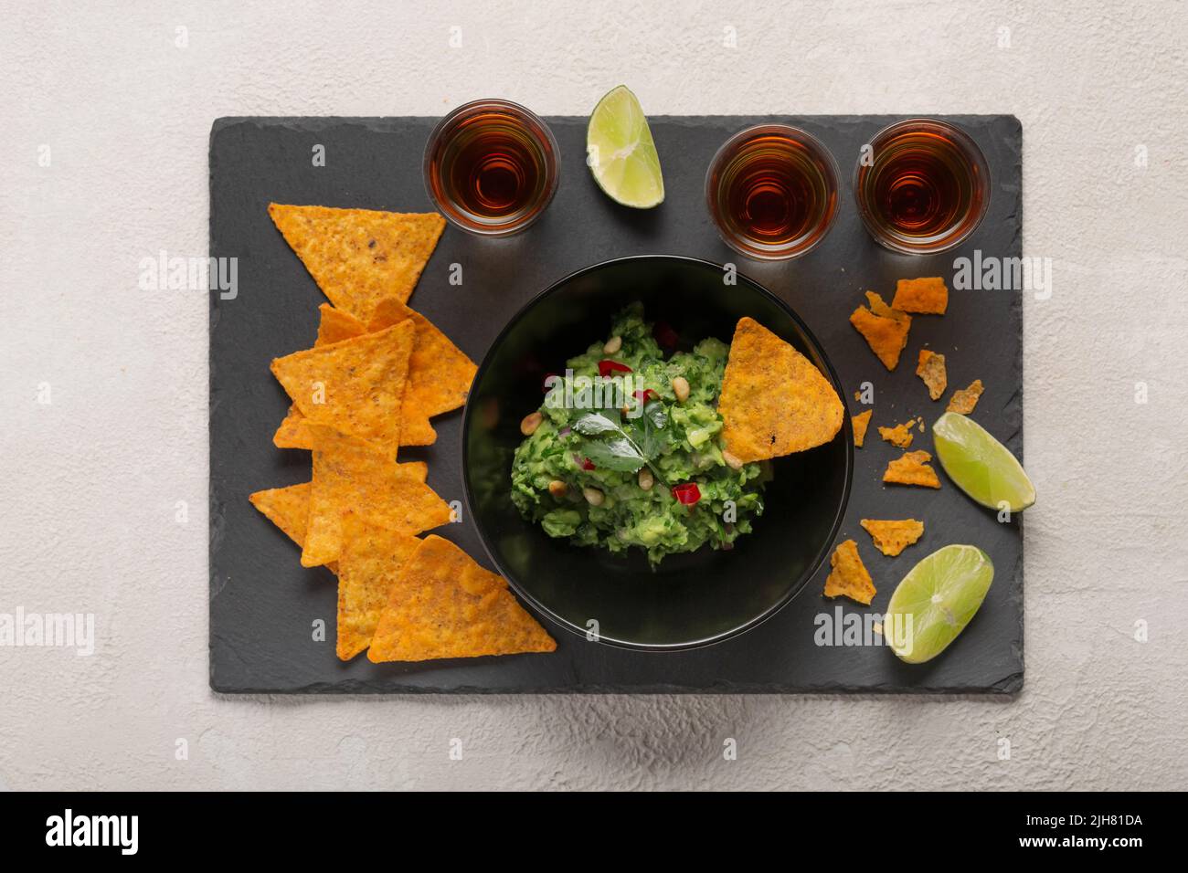 Latinamerican Mexican food party sauce guacamole, salsa, chips, and t ...