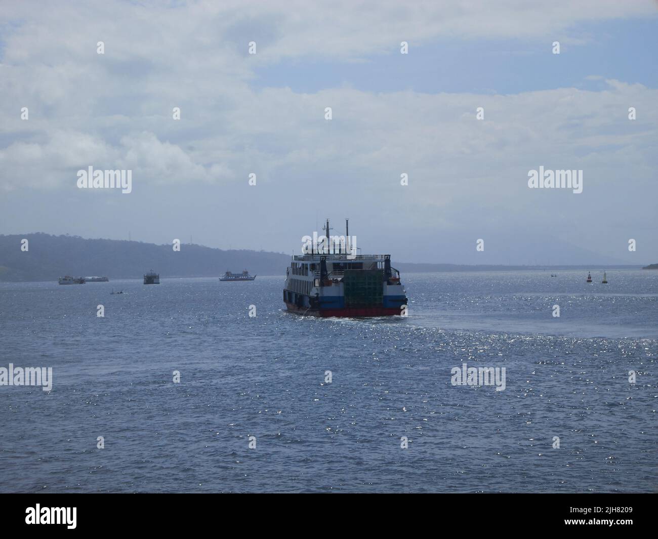 a passenger ferry that crosses the Bali Strait between Bali and Java ...
