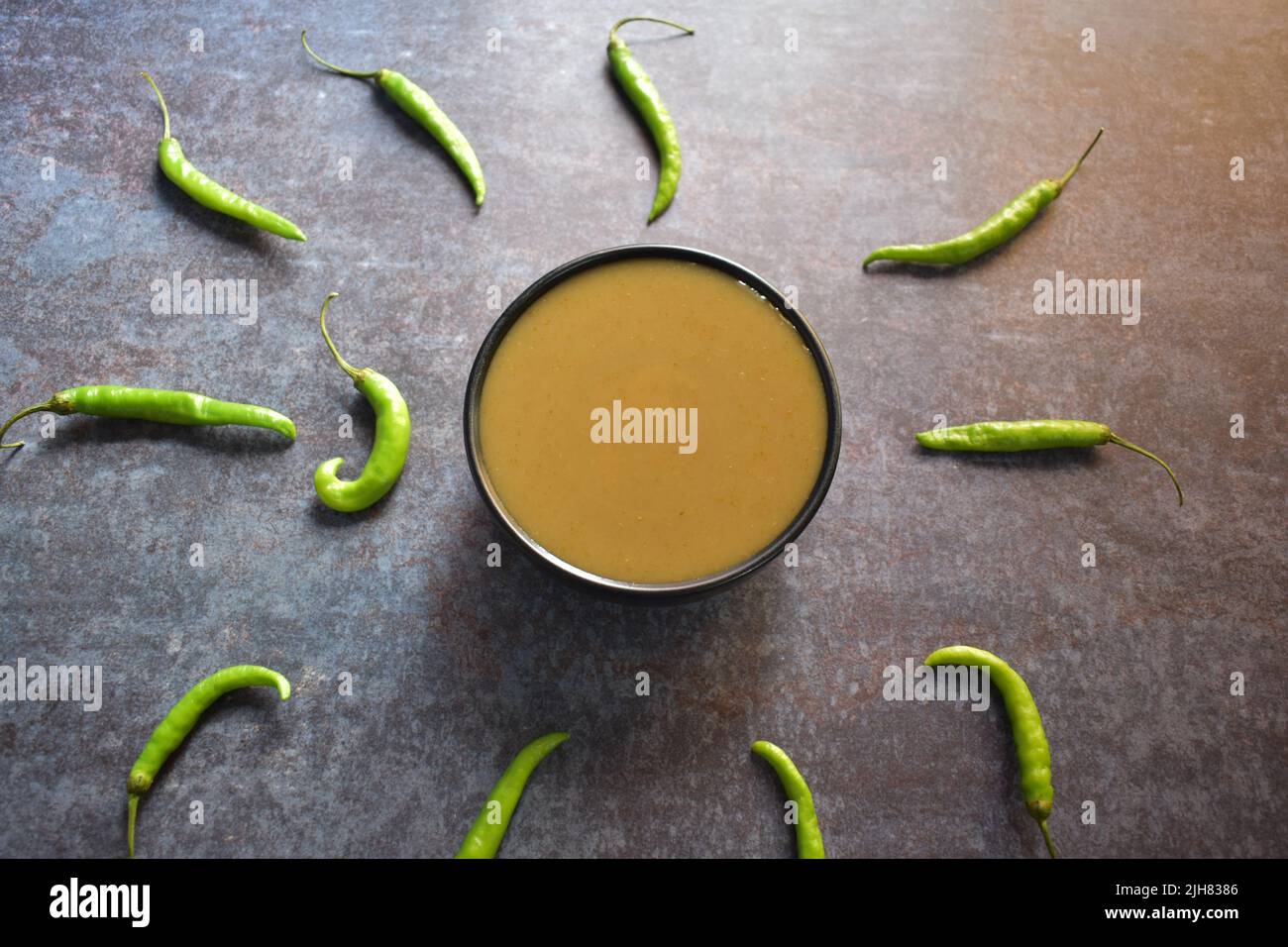 Fresh spicy green chili sauce Stock Photo - Alamy