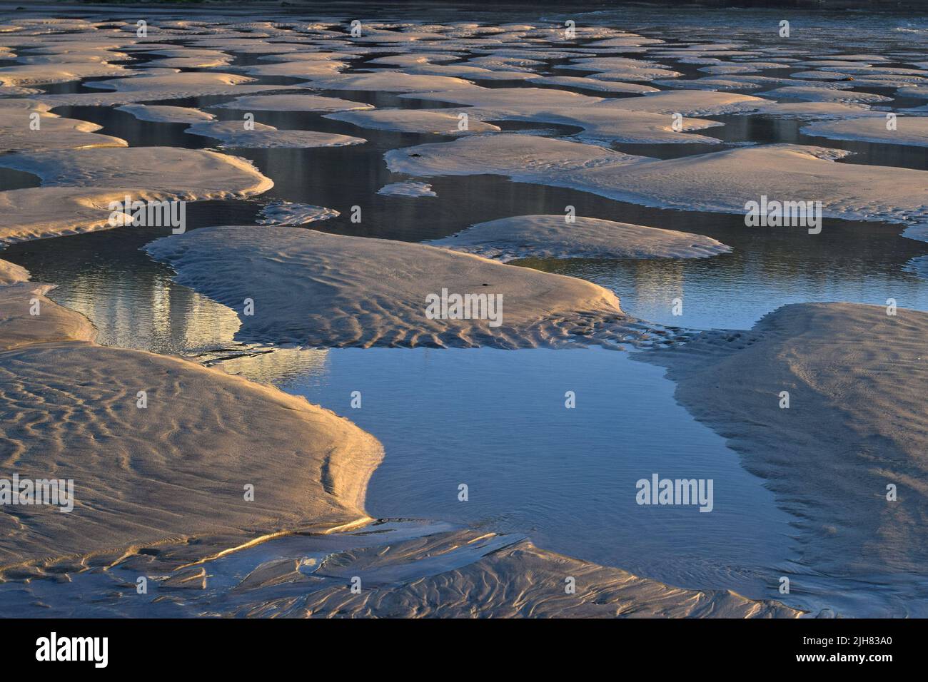 Rippled beach pools on Perranporth beach at low tide Stock Photo - Alamy