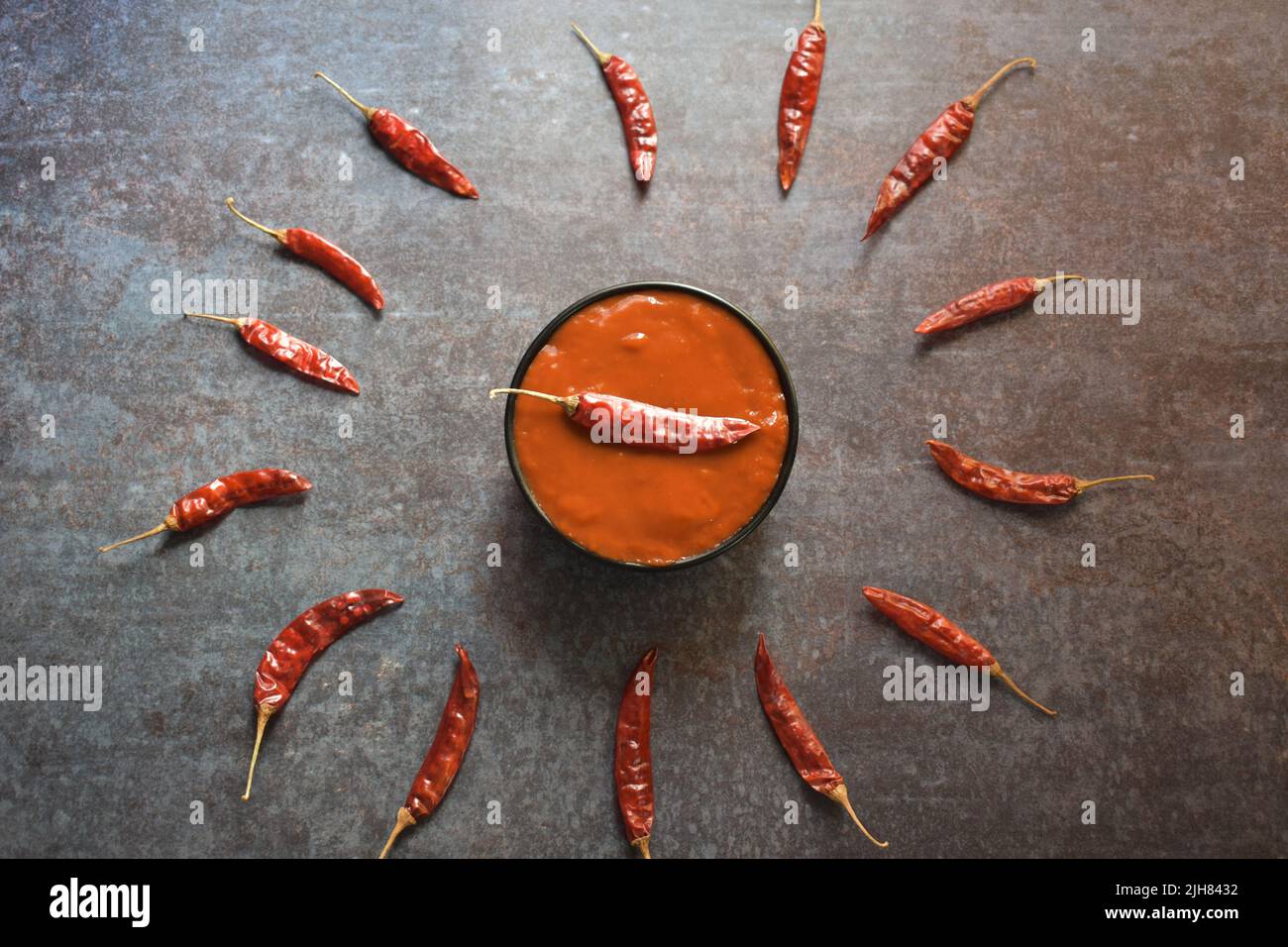 Spicy red chilli sauce in a bowl Stock Photo - Alamy