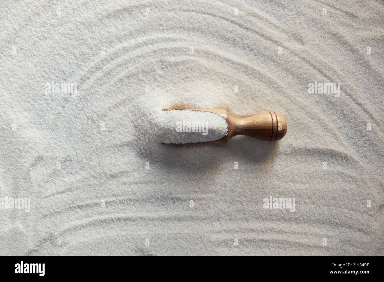 Raw dry rice semolina grains Stock Photo - Alamy